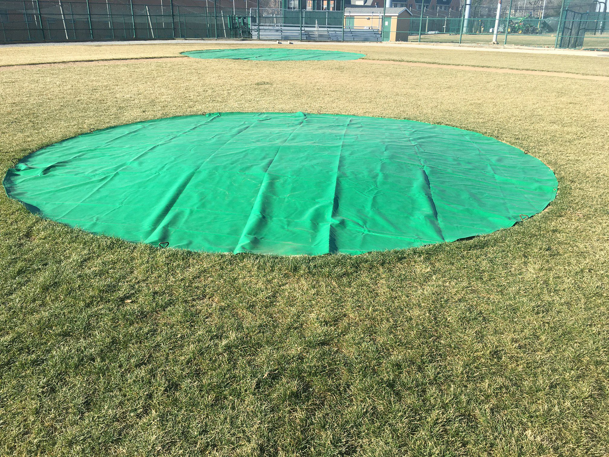 Using Tarps on Mounds and Plates - Advanced Turf Solutions