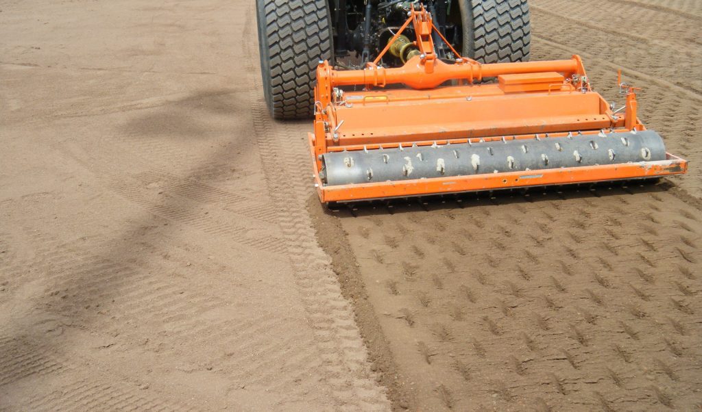 Adding New Infield Mix to Existing Material - Advanced Turf Solutions
